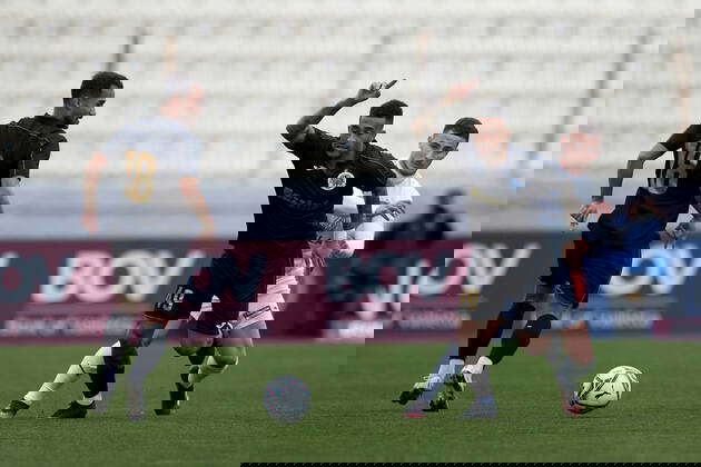 Gilmar Ribeiro Da Silva of Hibernians shields the ball away from Eslit ...