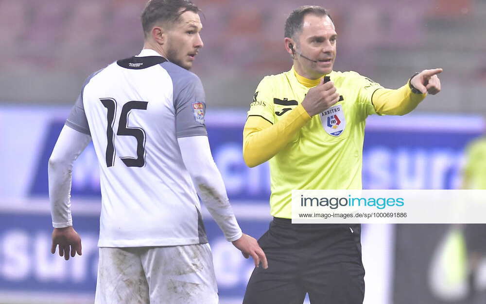 Mladen Jutric with the central referee Lucian Rusandu in the football ...
