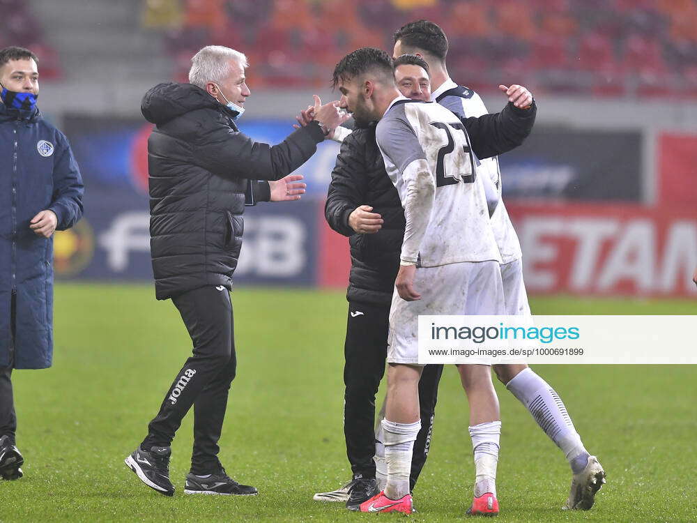 Marin Duna and Ilie Poenaru congratulate Tsvetelin Chunchukov after the ...