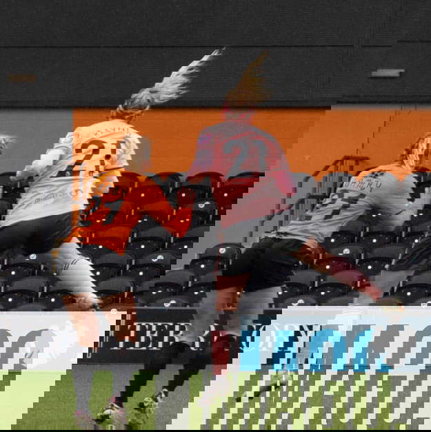 Flo Gamby 21 and Rebecca Rayner 21 battle for the ball during the Women ...