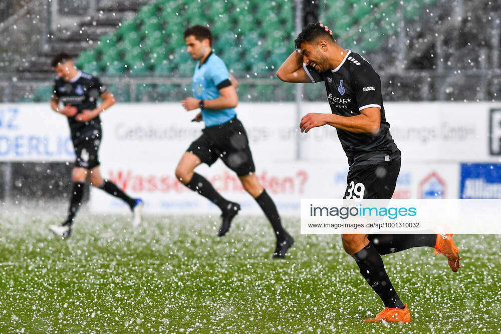 Dr Max Burda referee and players of MSV Duisburg escape from the ...