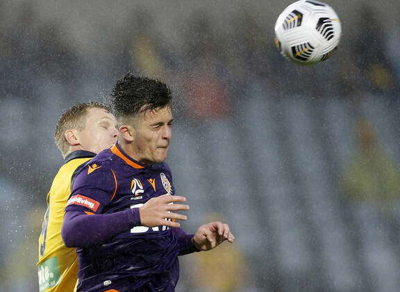ALEAGUE MARINERS GLORY, Luke Bodnar of Perth Glory checks his neck after a head clash with Matt