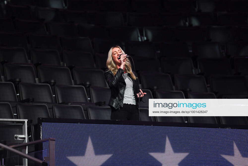 DETROIT, MI - MARCH 16: Singer Monica Notaro sings the US National ...