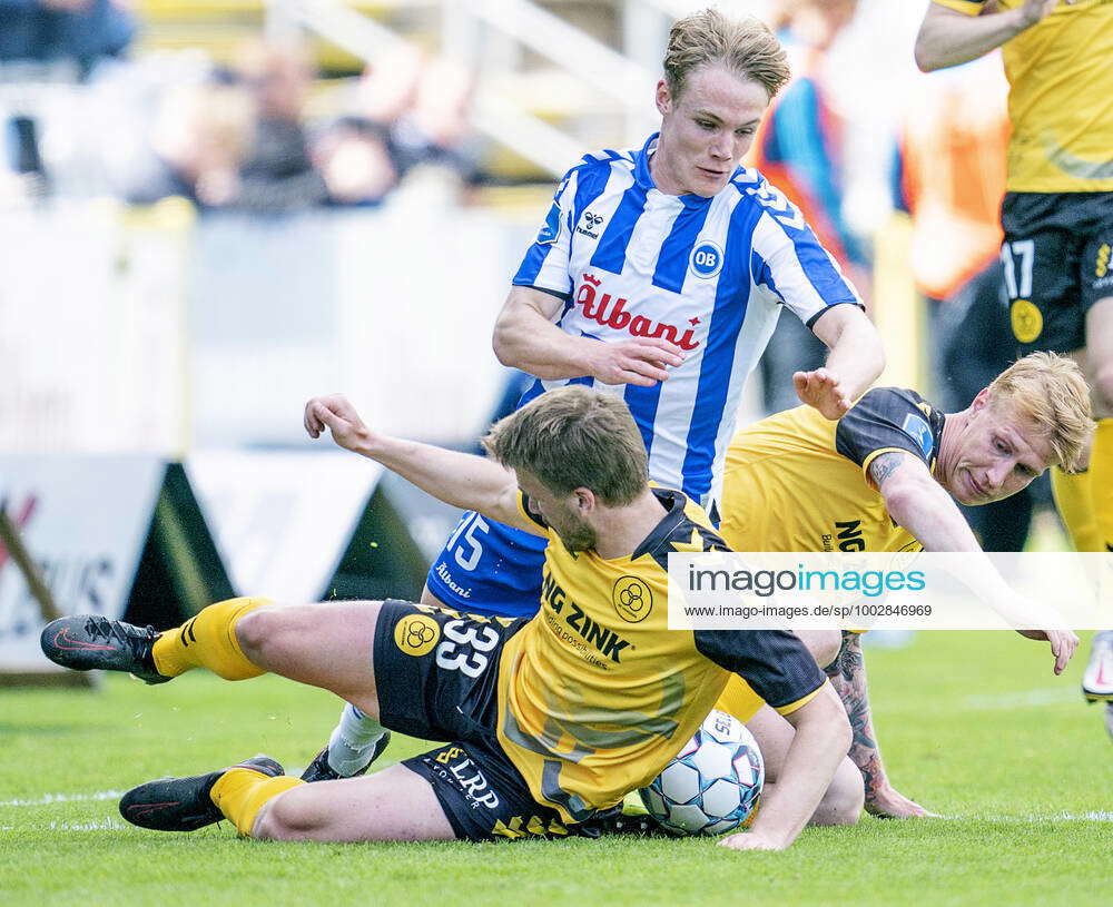 OBs Max Fenger in clash with AC Horsens Alexander Ludwig and Bjarke ...