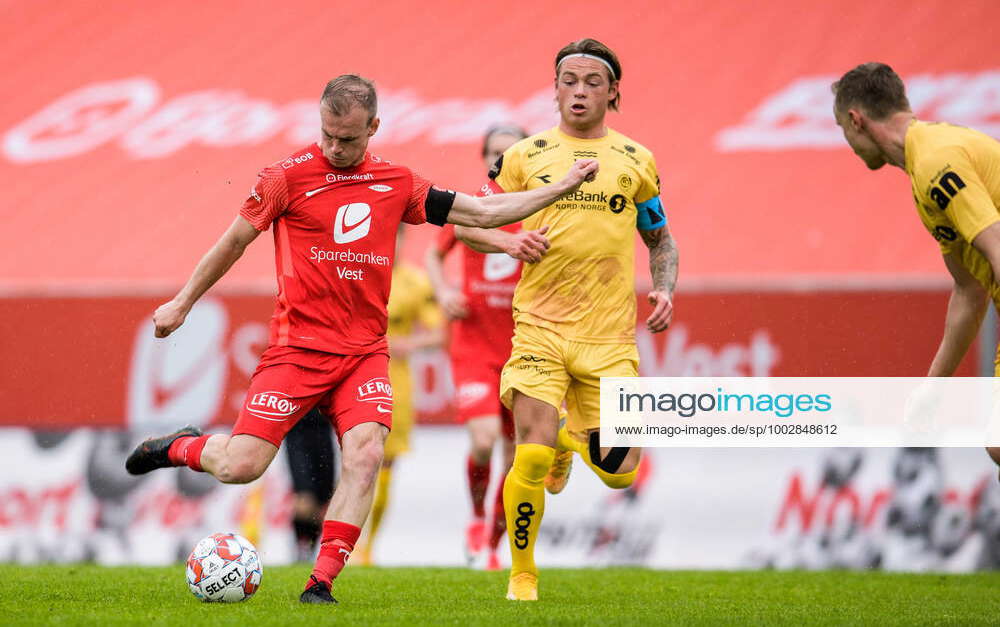 210524 Petter Strand of Brann and Patrick Berg of Bodo Glimt during the ...