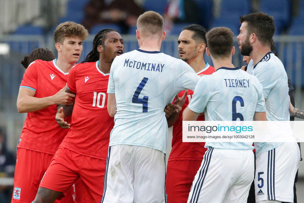 Gerson Rodrigues Luxembourg 10 discusses with Scott McTominay Scotland ...