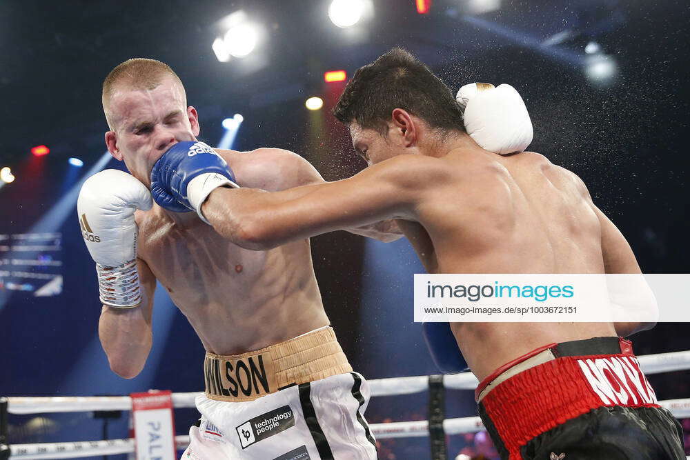 BOXING TSZYU SPARK, Liam Wilson cops a punch from Joe Noynay in their undercard bout, the WBO Asia