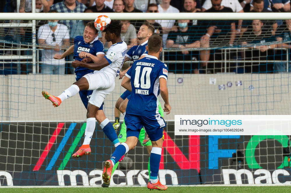 f l in header duel Robin Bormuth Karlsruher SC, 32, Peter John Sesay SV ...