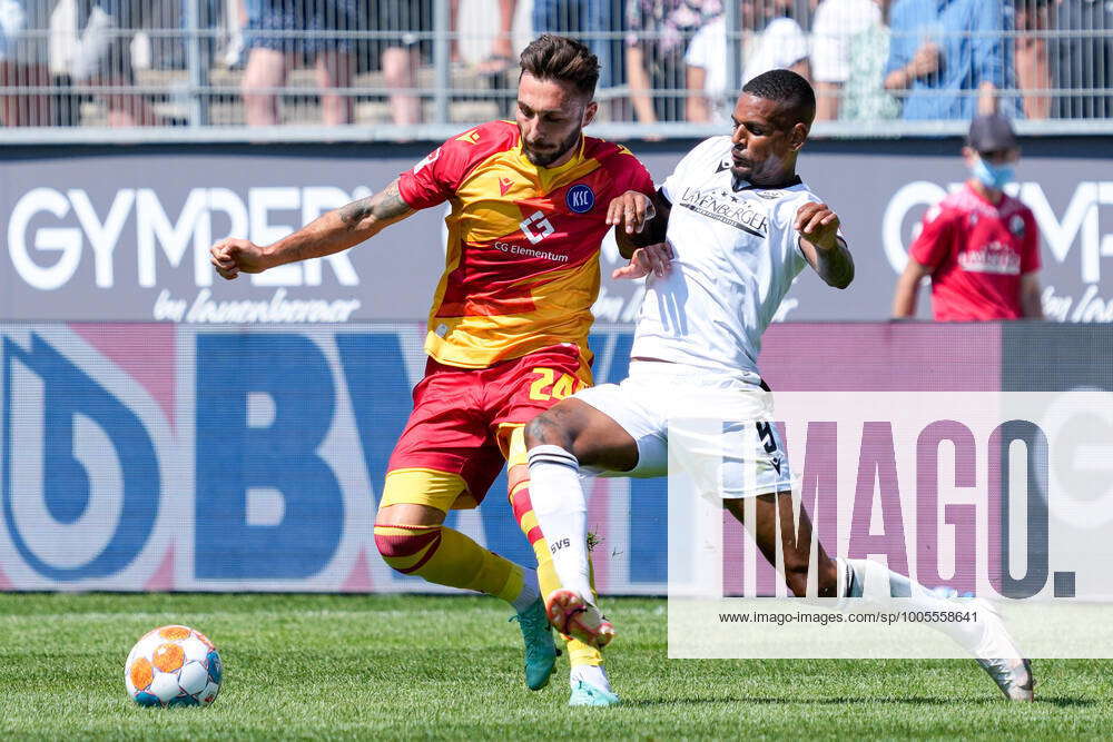 v li Fabian Schleusener KSC, 24 , Daniel Keita Ruel SVS, 9 , duel ...