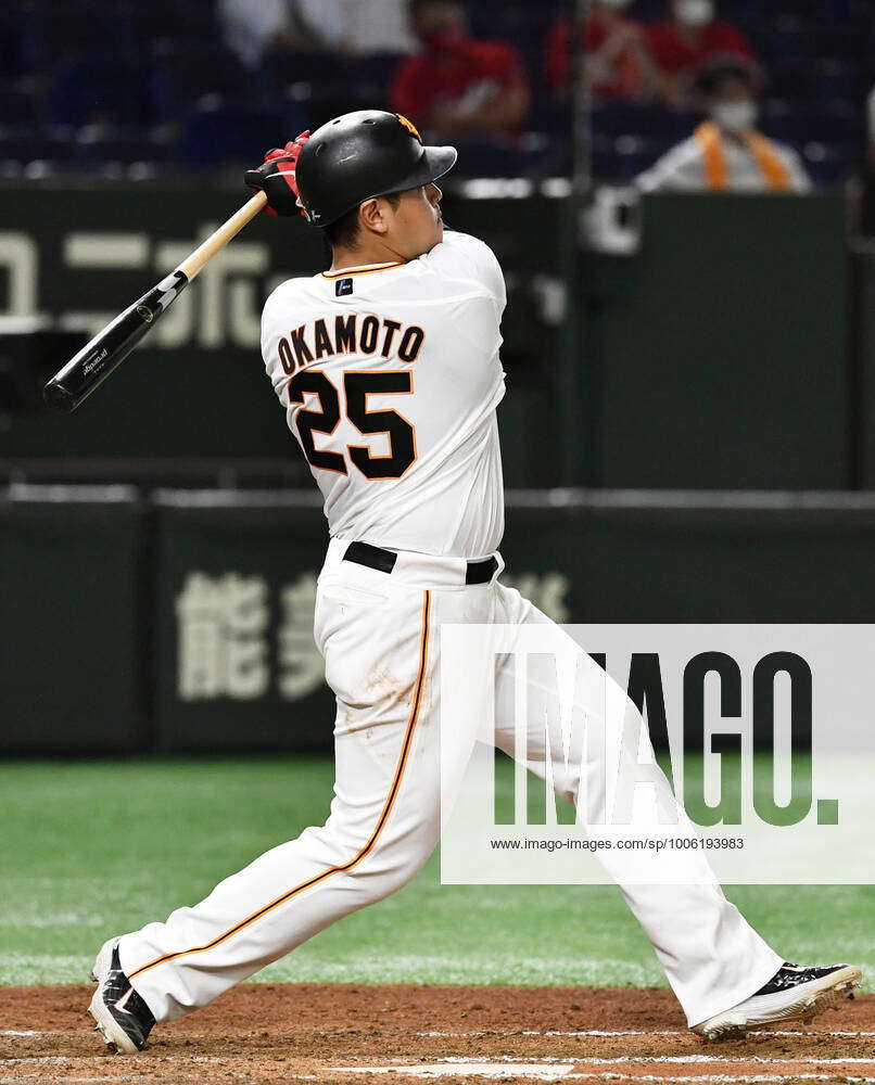 Baseball in Japan Kazuma Okamoto of the Yomiuri Giants hits a two-run ...