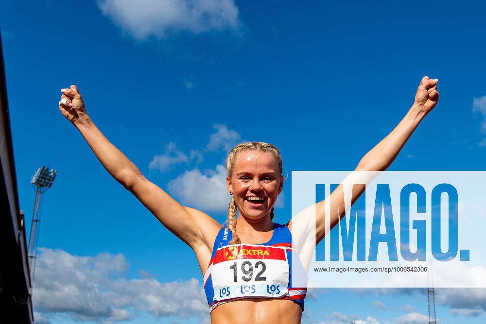 210912 Andrea Rooth celebrates after winning womens 100 meter hurdles ...