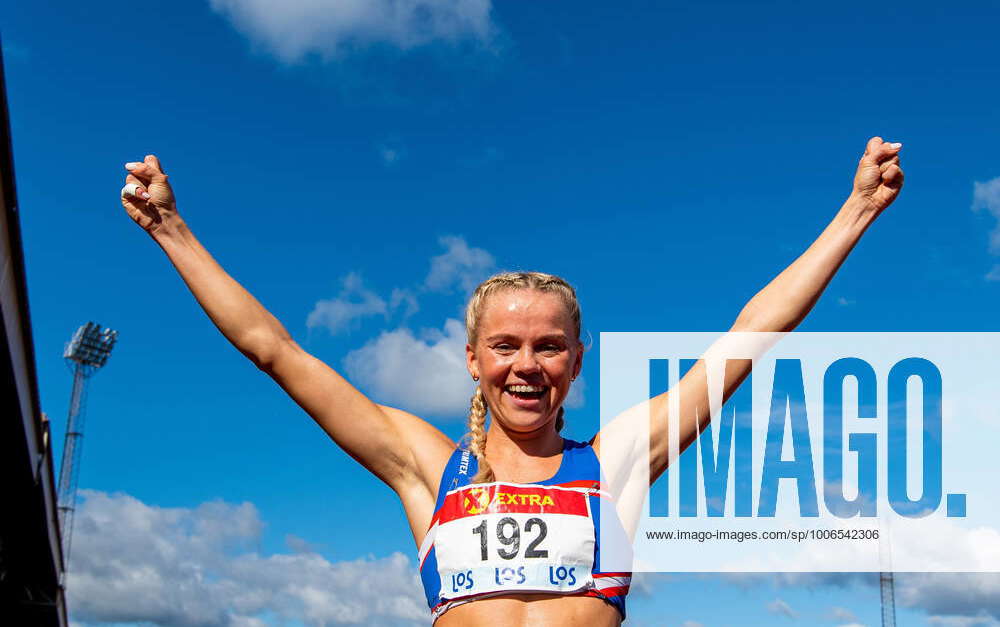 210912 Andrea Rooth celebrates after winning womens 100 meter hurdles ...