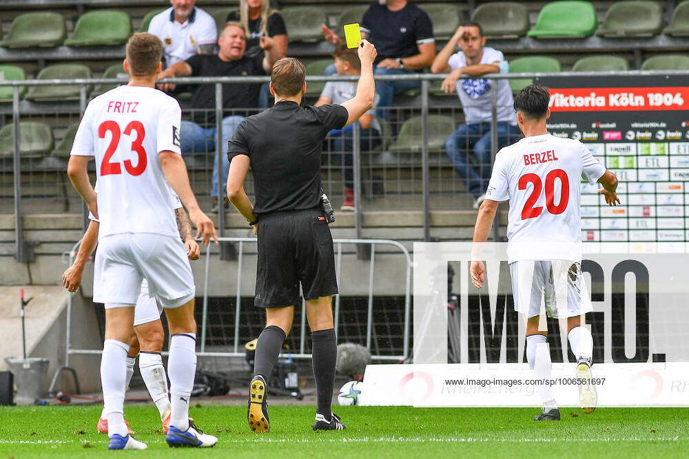 Dr Max Burda referee shows Aaron Berzel Viktoria Köln, 20 the yellow ...