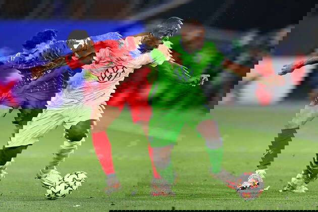 L R Suso FC Sevilla vs Jerome Roussillon VfL Wolfsburg Football UEFA ...