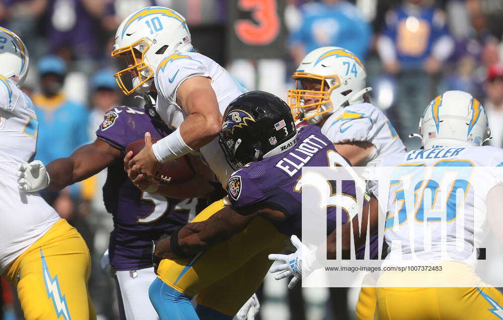 Los Angeles Chargers QB Justin Herbert is sacked by Baltimore Ravens S ...