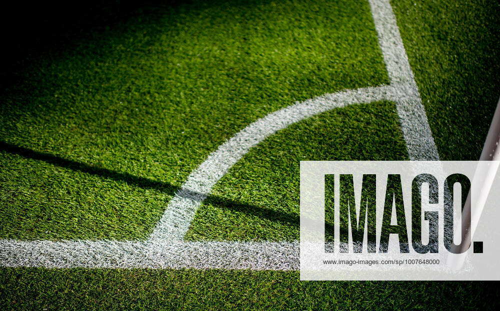 The corner of a football pitch with light and shadow Football 1 ...
