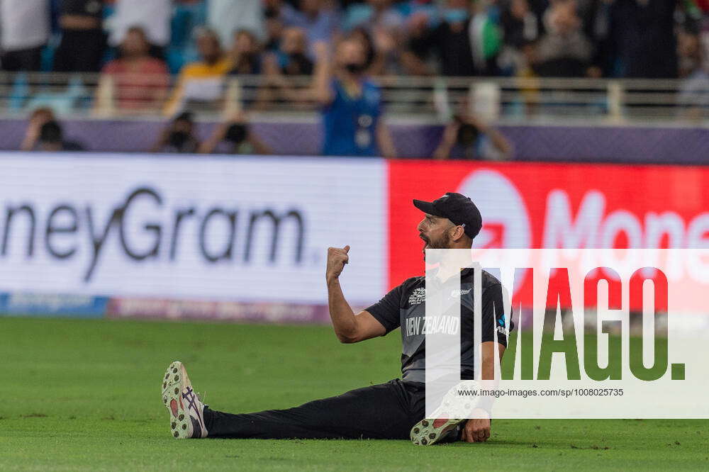 Daryl Mitchell of New Zealand celebrates the wicket of Aaron Finch ...