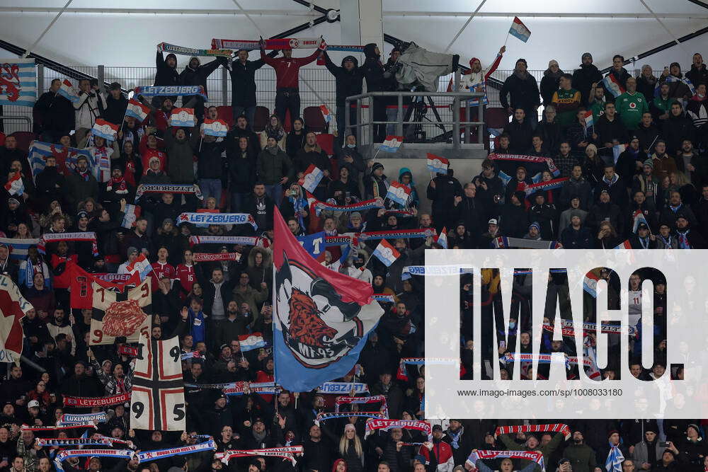 Fans of M Block Fanatics 95, M Block, with flags, scarves, red loewe ...