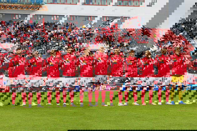 Malta national soccer team players drink water during a water break ...