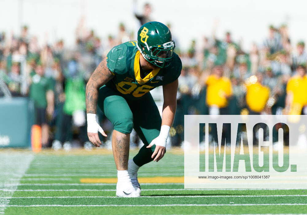November 13 2021: Baylor Bears defensive tackle Cole Maxwell (96) looks over the offense during the