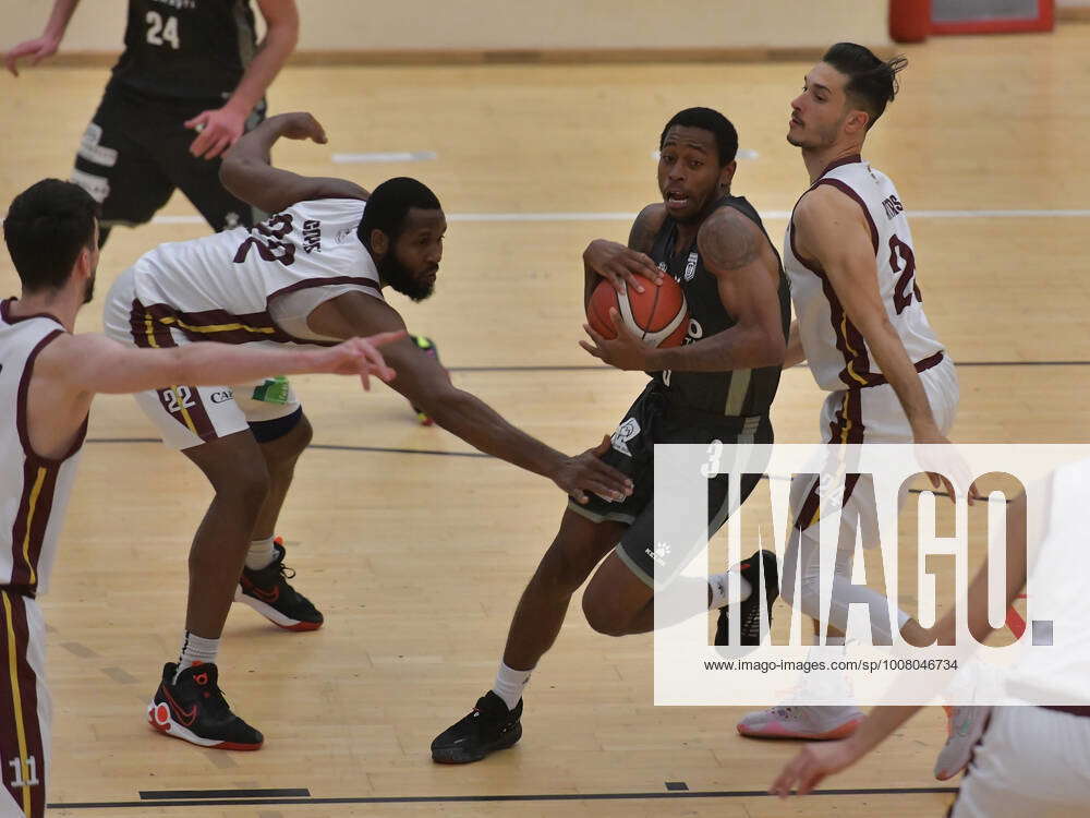 Erik Jerome Copes, Eric Nottage and Baris Aktas in the basketball match ...