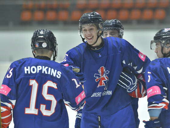 Logan Neilson is enjoying after a goal scored in the ice hockey match ...