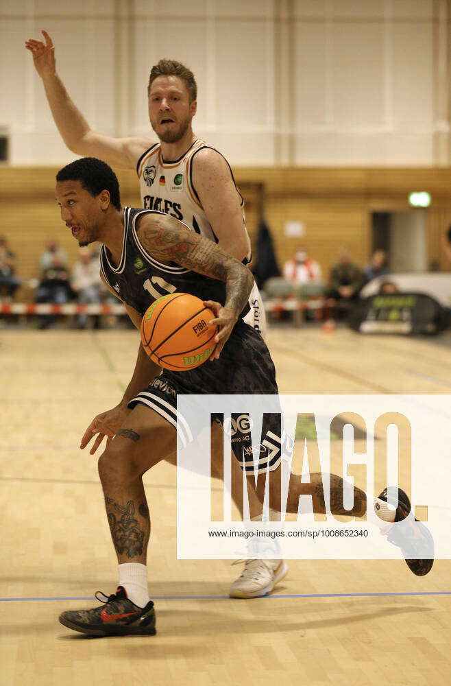 on the ball Laron Simmons Jena against Lucien Schmikale Eagles ...