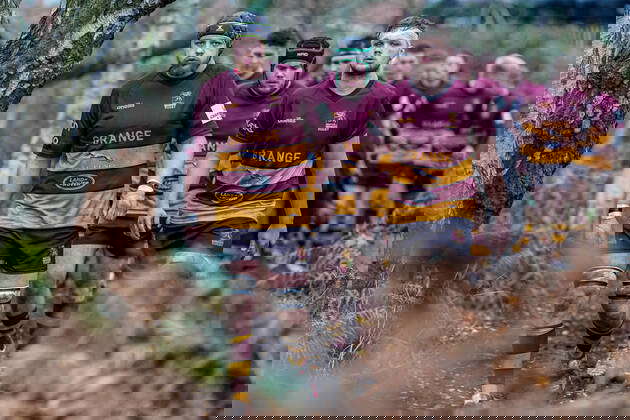 Captain Charlie BECKETT (4) of Ampthill Rugby leads out his team after ...