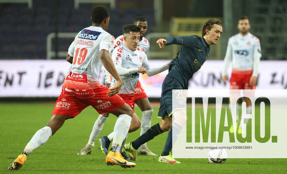 Kortrijk s Abdelkahar Kadri and Anderlecht s Kristoffer Olsson fight ...