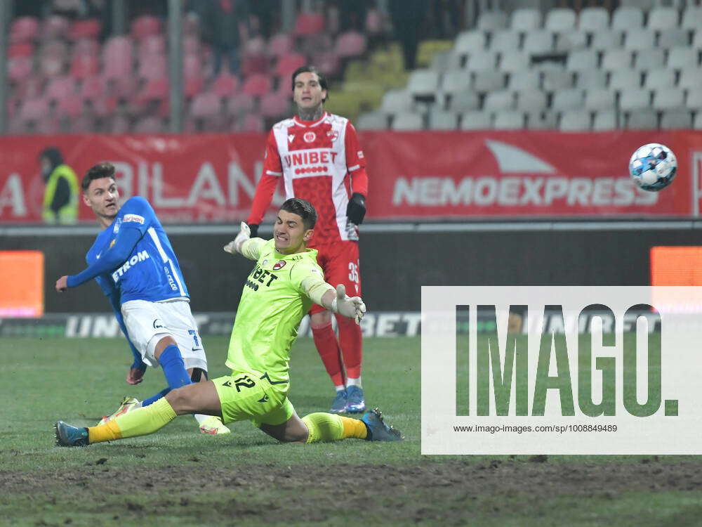 George Danut Ganea scores a goal for Stefan Razvan Popa in the goal of ...