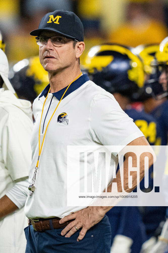 Michigan Wolverines head coach Jim Harbaugh looks on during warm ups ...