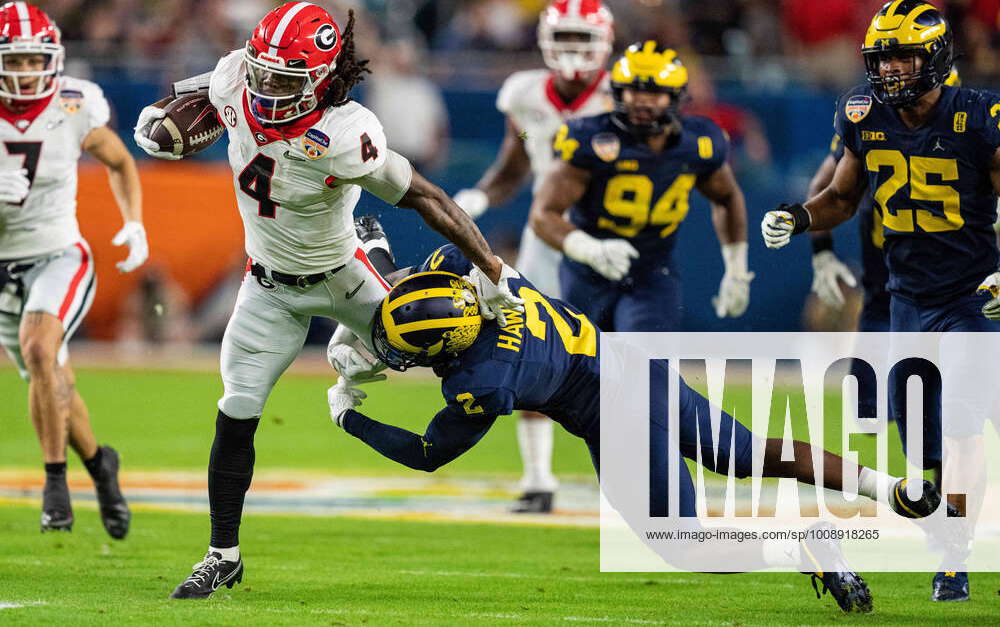 Michigan Wolverines defensive back Brad Hawkins (2) tackles Georgia ...