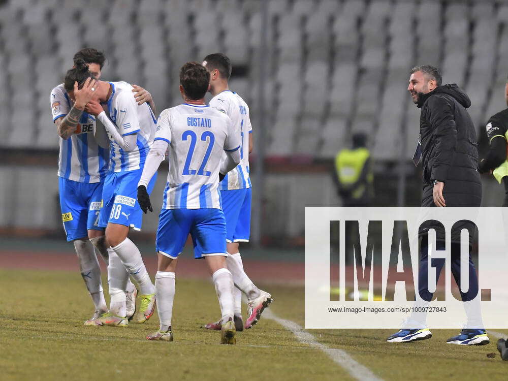 Paul Papp kisses Atanas Ioan Trica after a goal scored under the ...