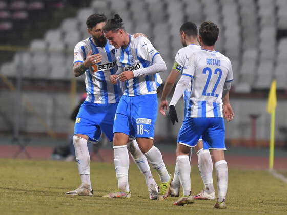 Paul Papp kisses Atanas Ioan Trica after a goal scored under the ...