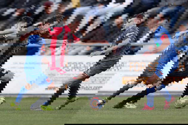 Benjamin Schmit Rodange 28 in duel with Kai Merk Petingen 68, Yannick ...