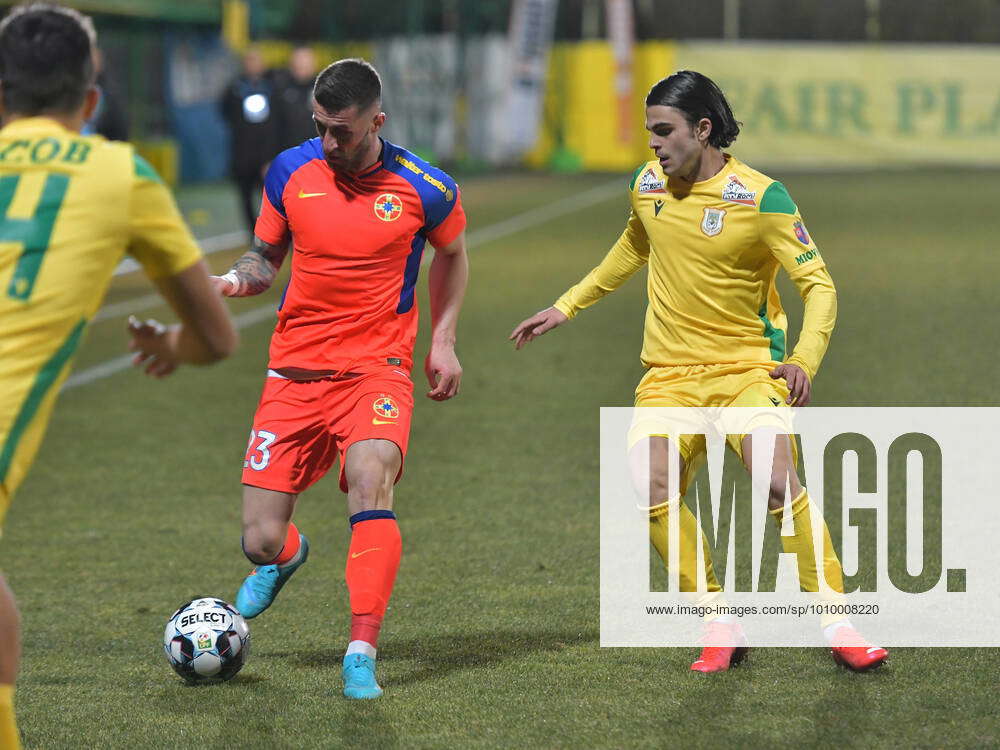 Ovidiu Marian Popescu and Vlad Mitrea in the football match between CS ...