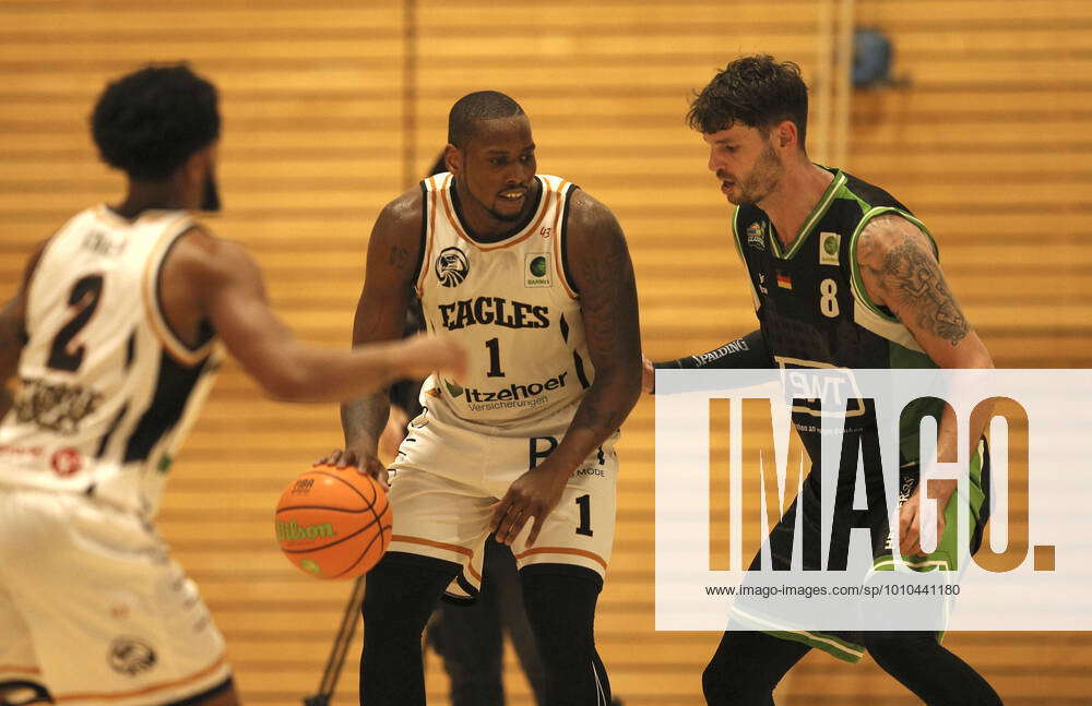 Christopher Hooper Eagles against Enosch WOLF , right Basketball Men ...