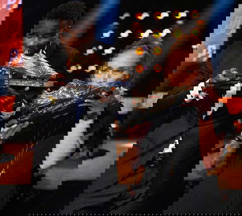 GOUDEN SCHOEN Paul Onuachu and Janice Cayman pictured celebrating after ...