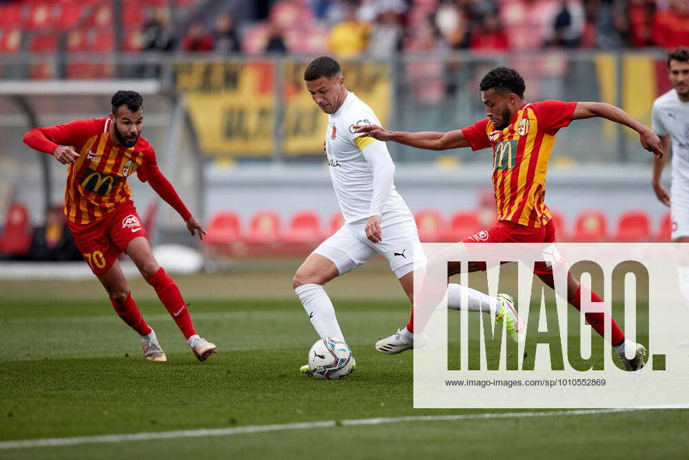 Kilian Bevis (R) of Birkirkara challenges Jean Borg (C) of Valletta ...