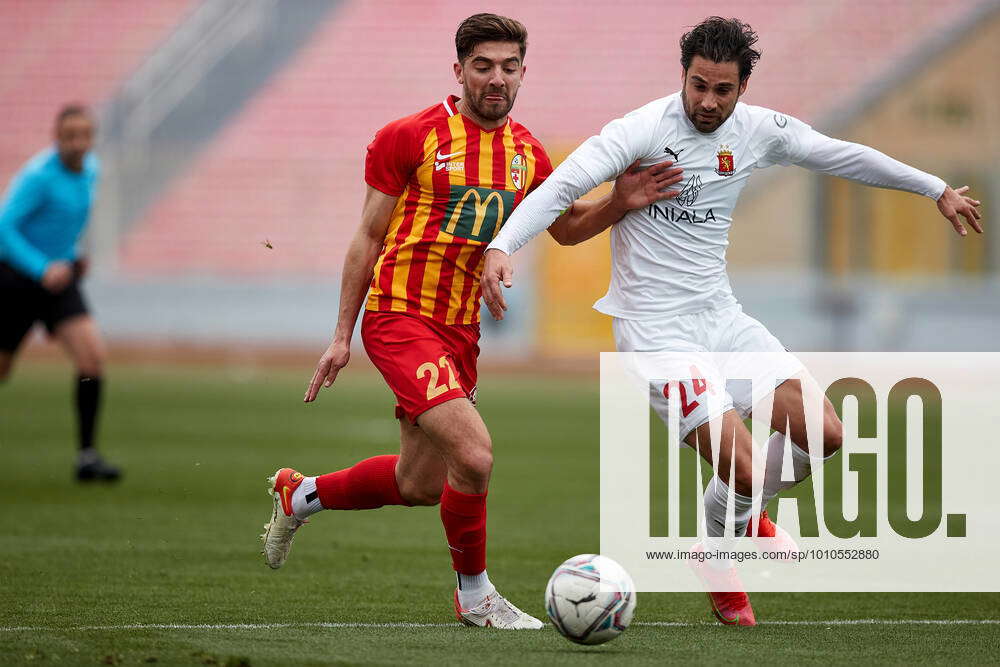 Cain Attard (L) of Birkirkara vies for the ball with Rowen Muscat (R ...