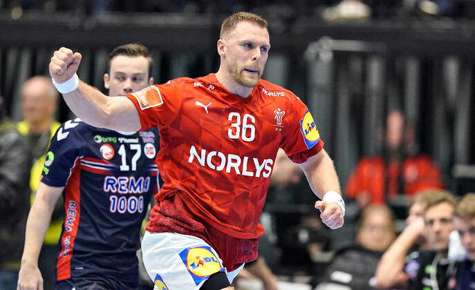 Denmarks Benjamin Jacobsen cheers in the Golden League mens handball ...