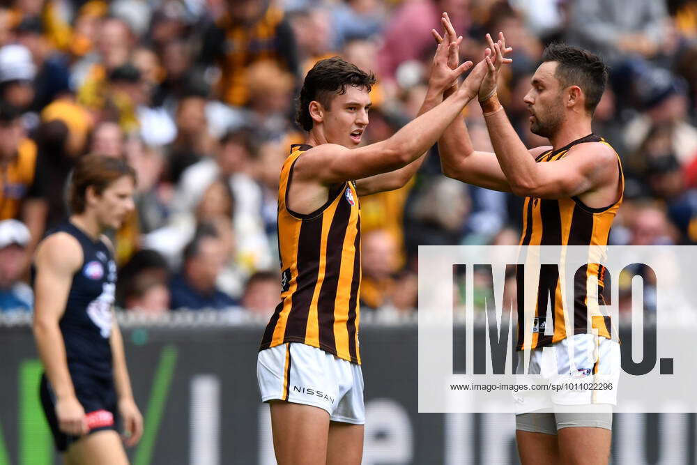 AFL BLUES HAWKS, Connor MacDonald of Hawthorn celebrates kicking a goal ...