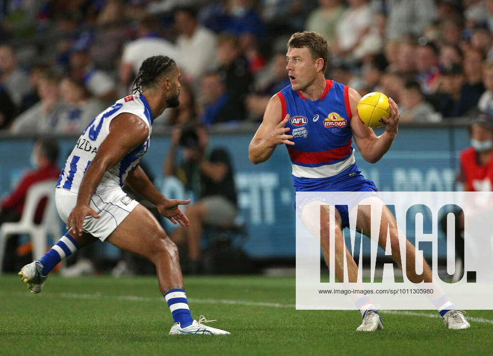 AFL KANGAROOS BULLDOGS, Jack Macrae of the Bulldogs under pressure from ...