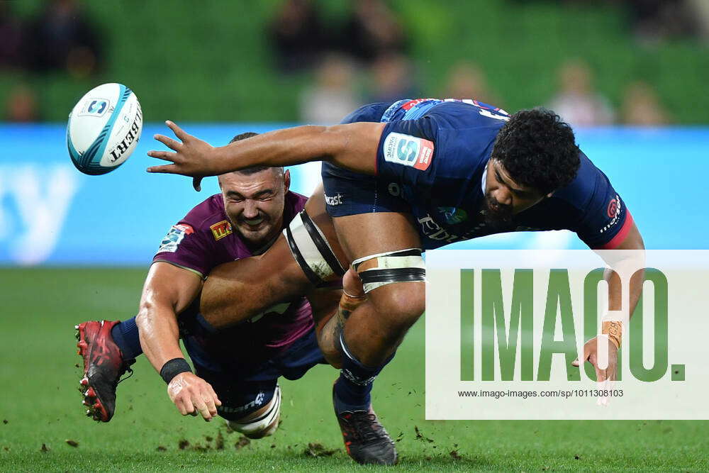 SUPER RUGBY REBELS REDS, Connor Vest of the Reds tackles Tamati Loane ...