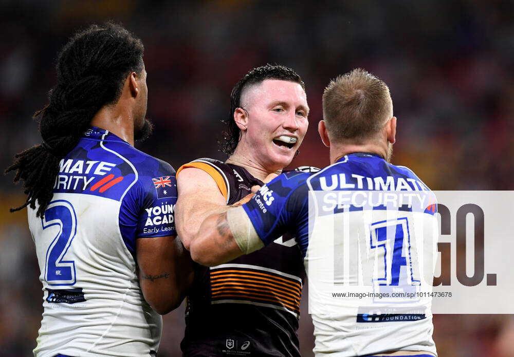 NRL BRONCOS BULLDOGS, Tyson Gamble of the Broncos wrestles with Jayden ...