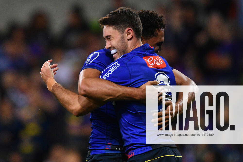 NRL STORM WARRIORS, Nick Meaney of the Storm (left) celebrates with ...