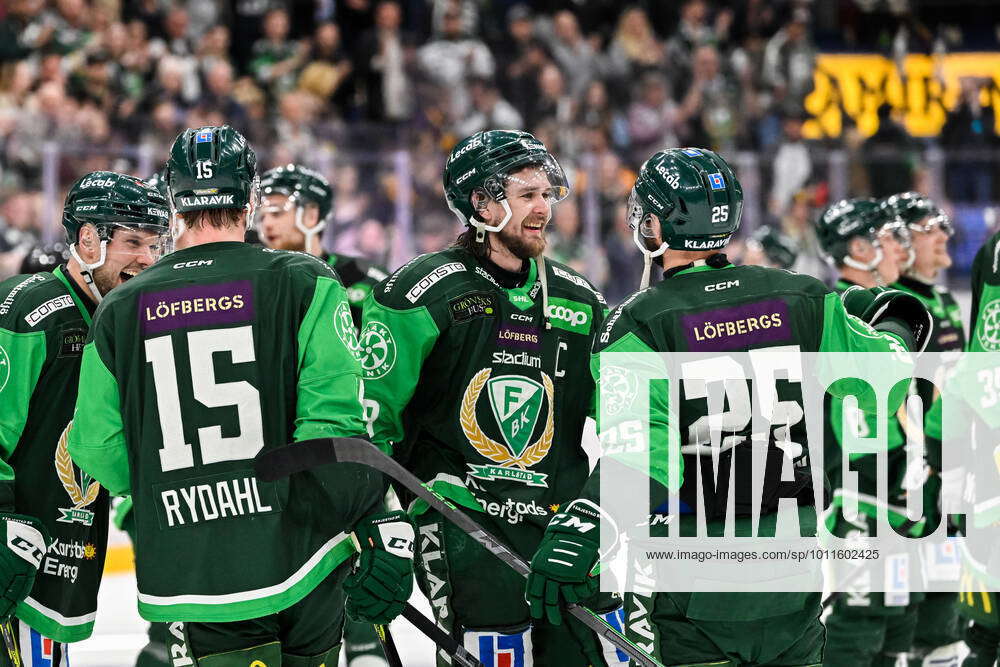 220426 Färjestads Linus Johansson cheers with teammates after semi ...