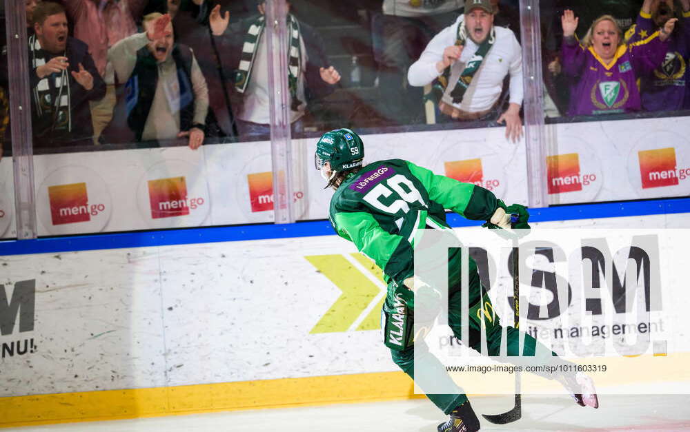 220426 Färjestads Linus Johansson cheers after the win in semifinal six ...