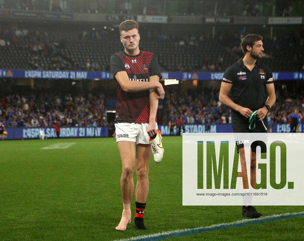 AFL BULLDOGS BOMBERS, Nik Cox of the Bombers injured after the AFL ...