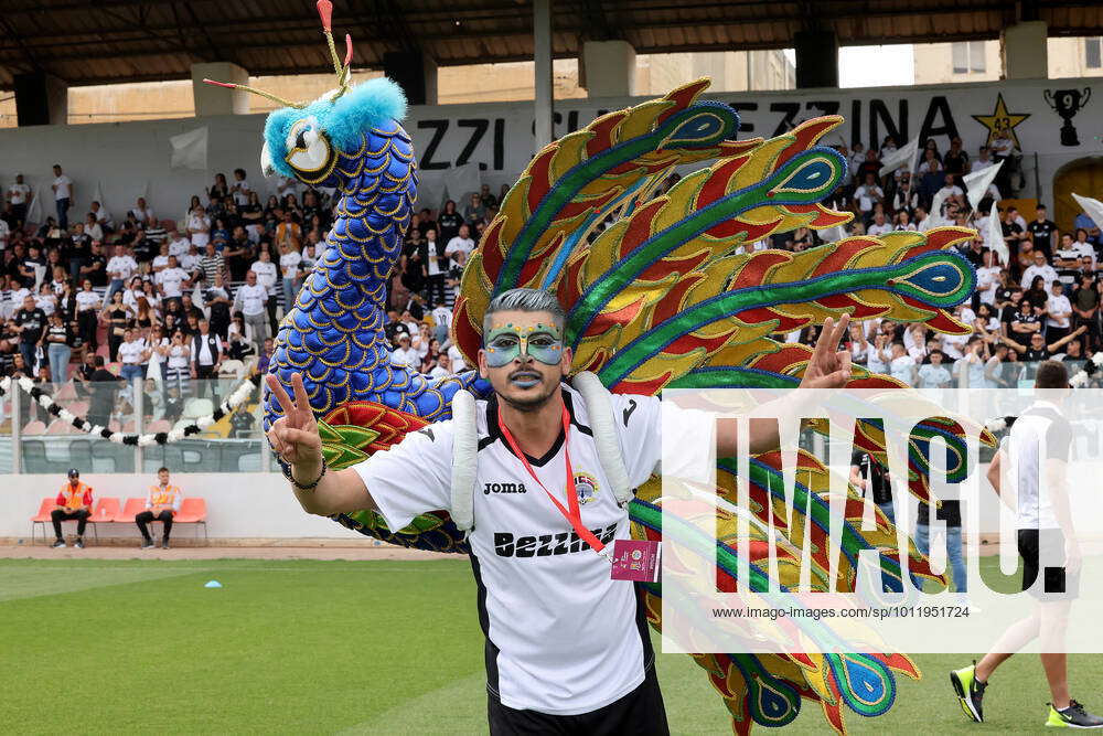 The Hibernians FC official mascot dressed as a peacock ahead of the ...